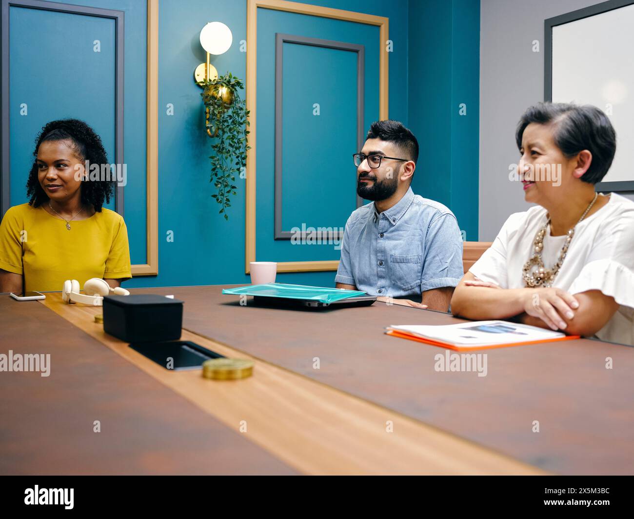 Business team three young colleagues hi-res stock photography and ...