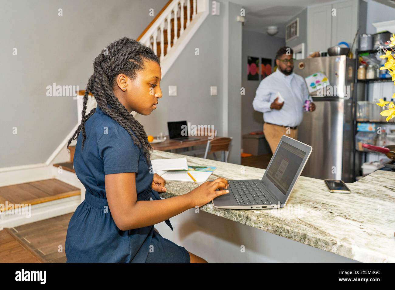 Girls using laptop in hi-res stock photography and images - Alamy