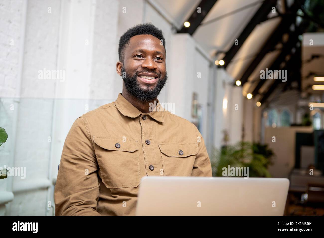 Content young man beard using hi-res stock photography and images - Alamy