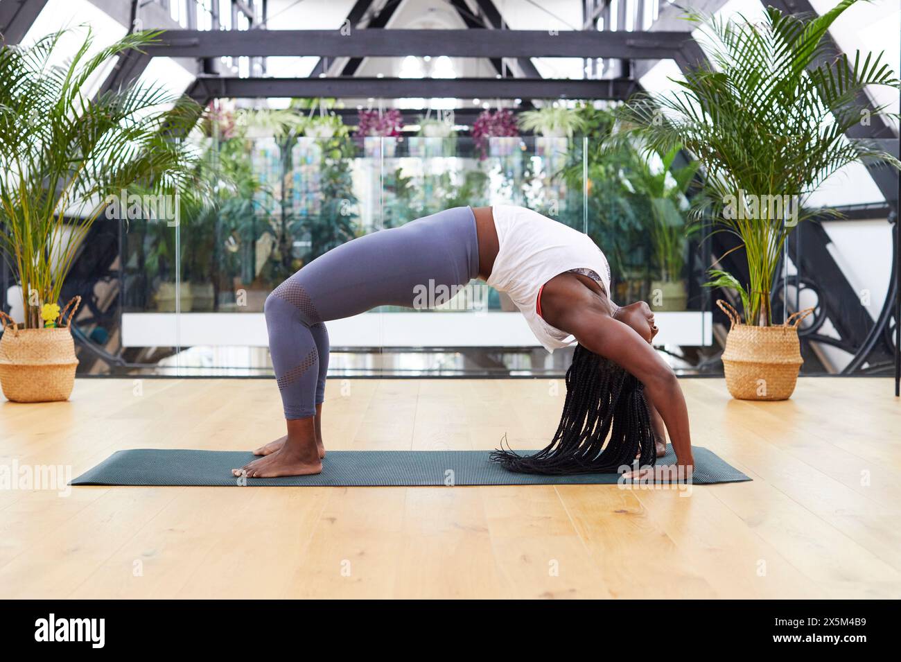 Woman bending over table hi-res stock photography and images - Alamy