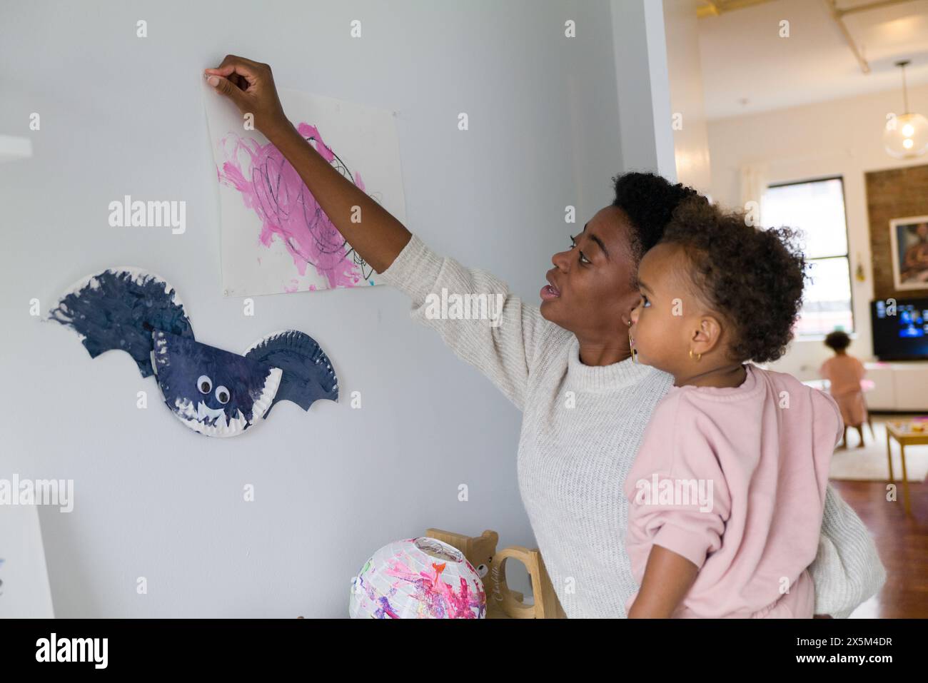 Hanging hanging paintings hi-res stock photography and images - Alamy