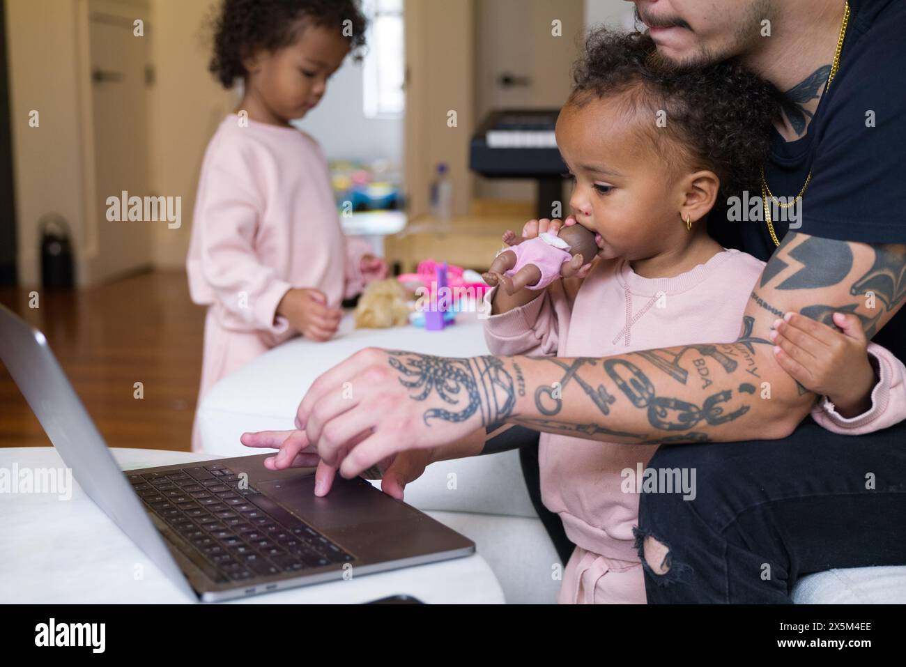 Father with children working home hi-res stock photography and images ...
