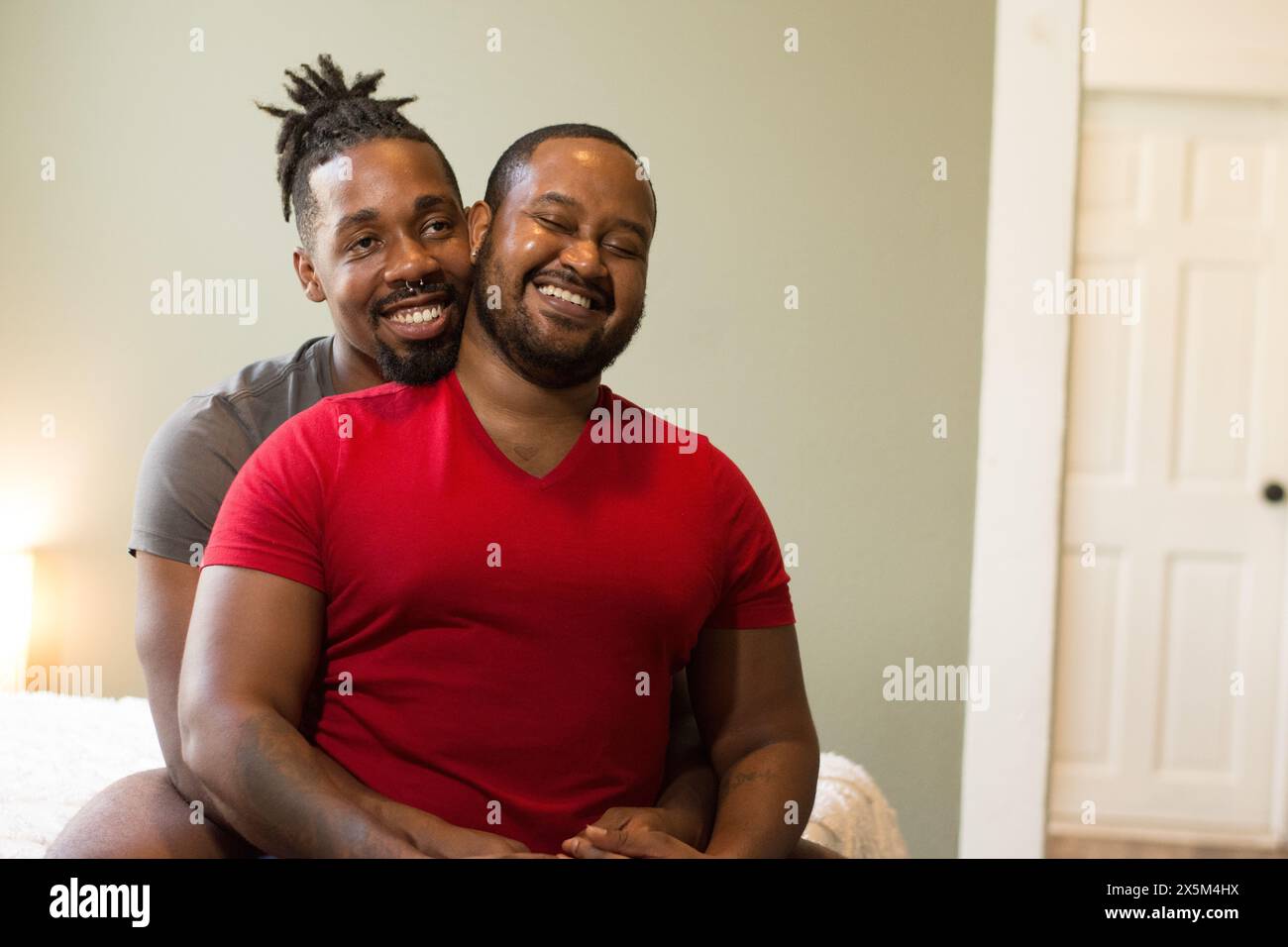 Hugging male hi-res stock photography and images - Alamy
