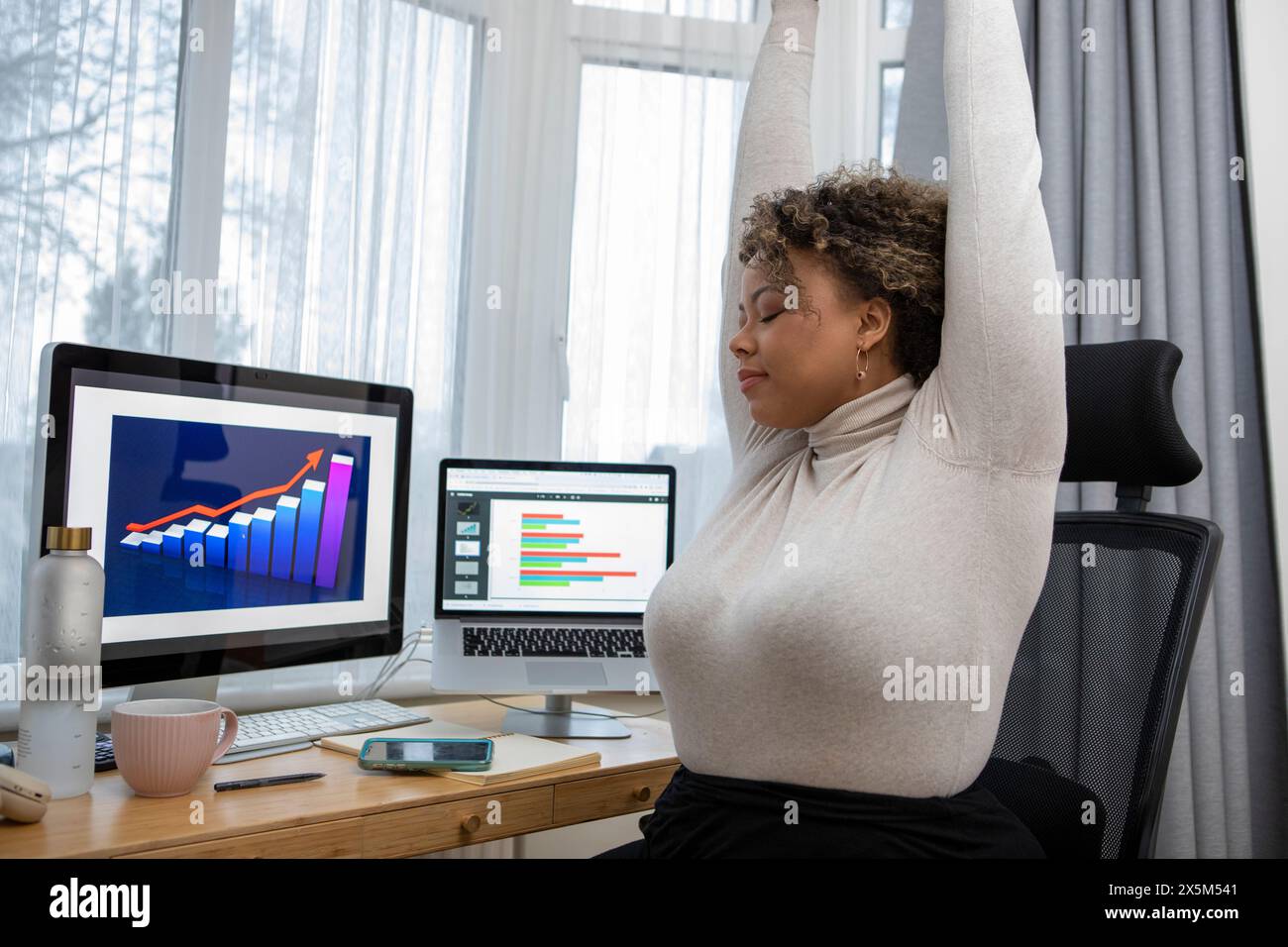 Office desk window woman hi-res stock photography and images - Alamy