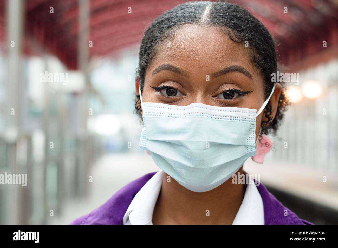 Young black person wearing coronavirus hi-res stock photography and ...