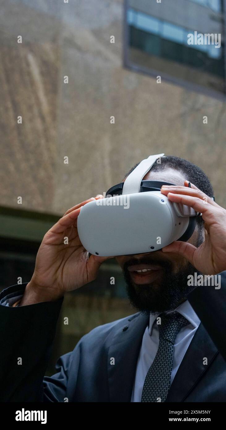 Adjusting headset hi-res stock photography and images - Alamy