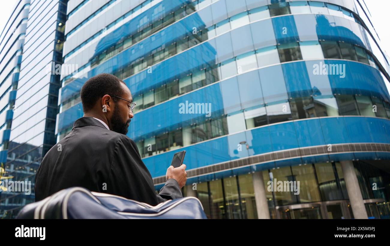 Business man building hi-res stock photography and images - Alamy