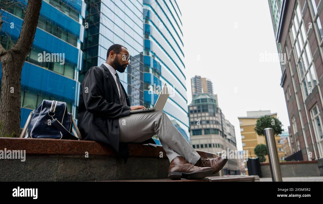 Business man building hi-res stock photography and images - Alamy
