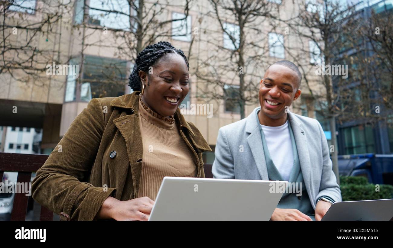 Business man woman using hi-res stock photography and images - Alamy