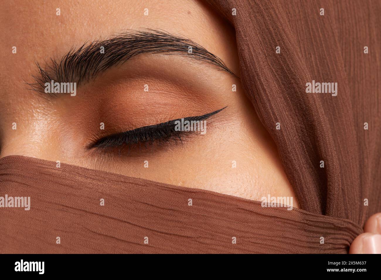 Partially closed eye hi-res stock photography and images - Alamy