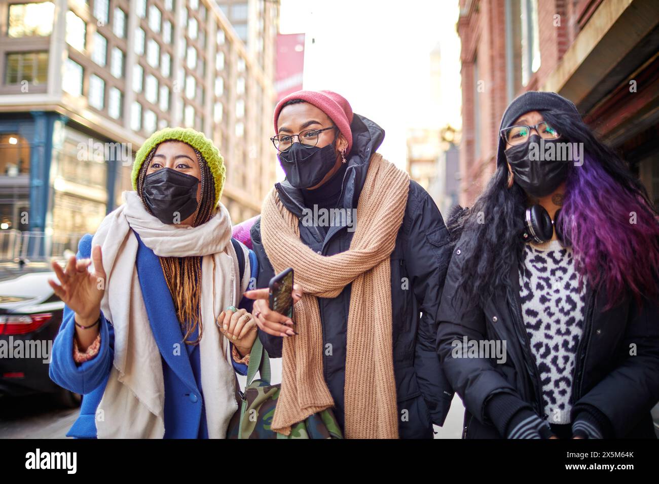 Mixed race friends face masks hi-res stock photography and images - Alamy