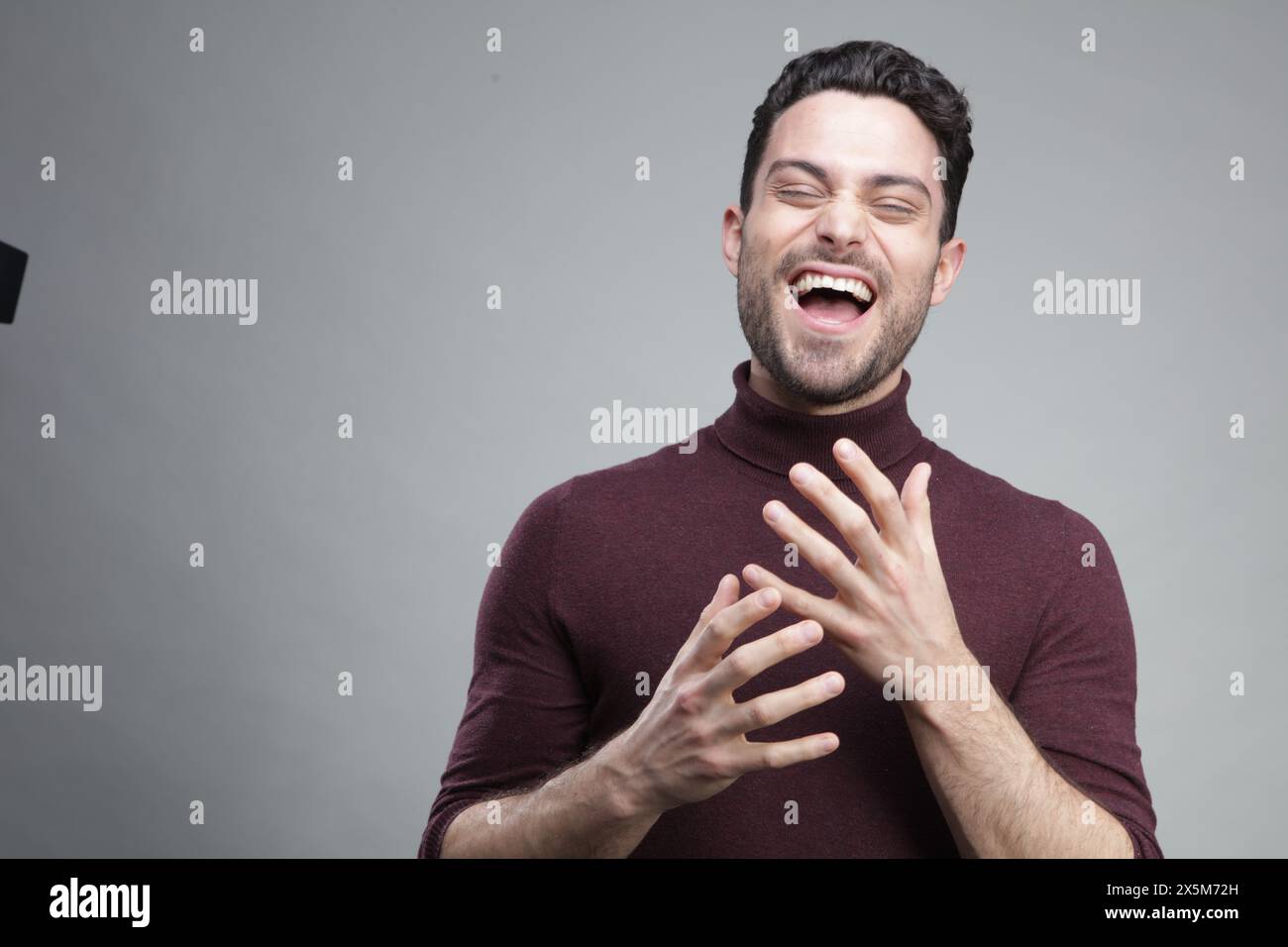 Young man singing Stock Photo - Alamy