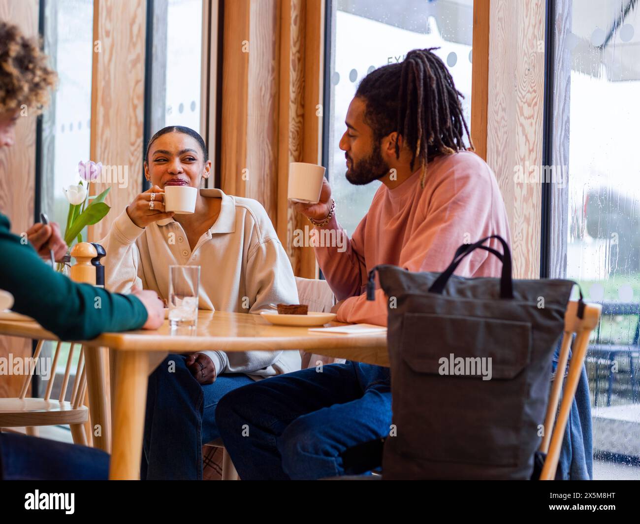 Group men women in cafe hi-res stock photography and images - Alamy