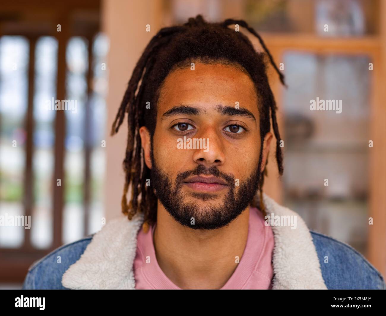 Serious mixed race man dreadlocks hi-res stock photography and images ...