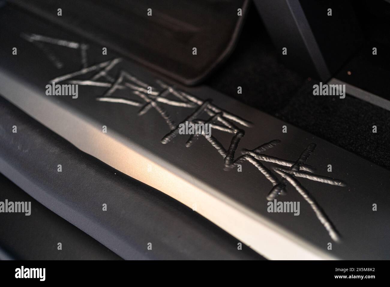 Close-Up of Tesla Cybertruck Signature Metal Engraving Stock Photo - Alamy