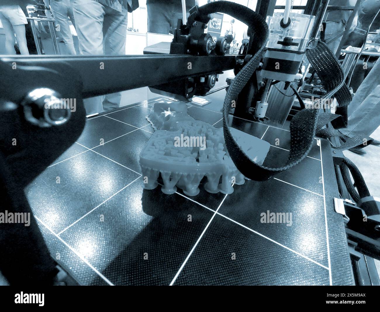 Abstract object printing on 3D printer with molten plastic close-up. 3D ...