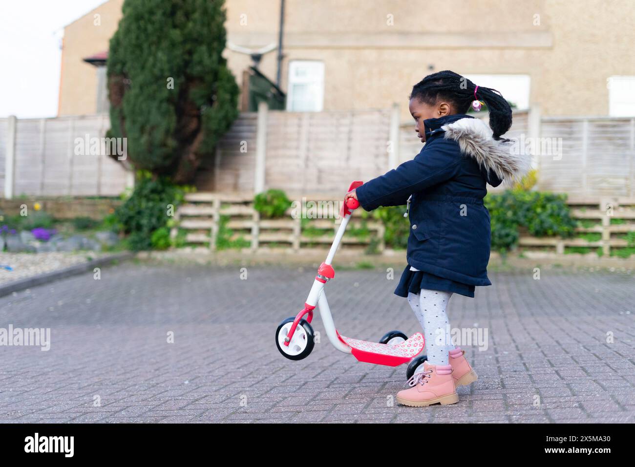 Side view girl push hi-res stock photography and images - Alamy