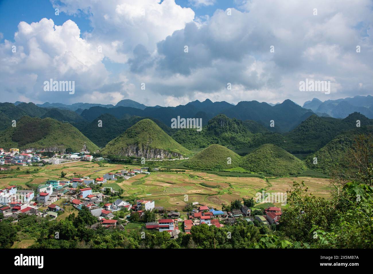 View of the Twin Mountains and limestone karst plateau from Quan Ba ...
