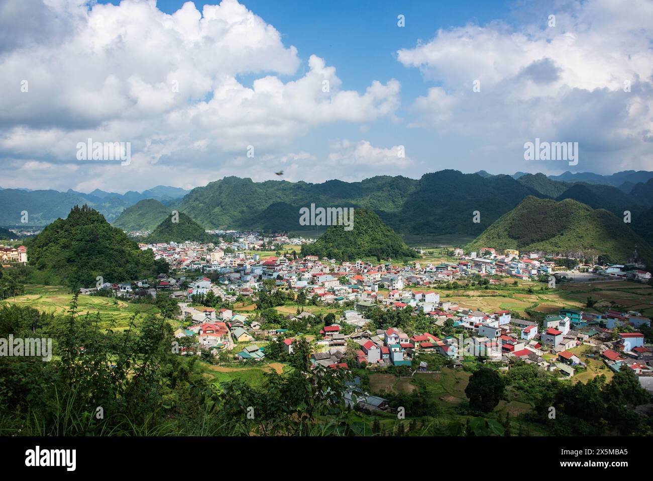 View of the Twin Mountains and limestone karst plateau from Quan Ba ...