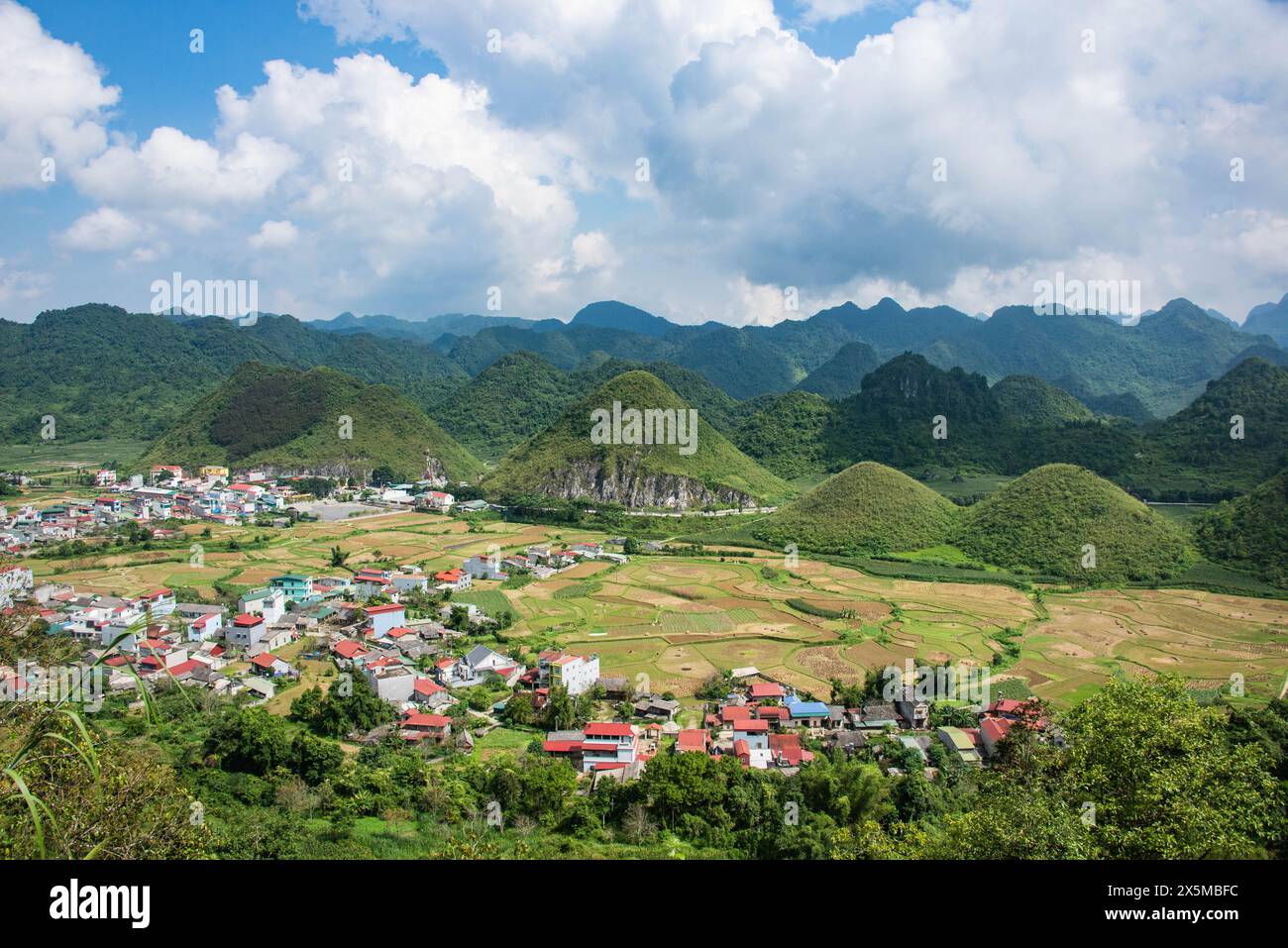 View of the Twin Mountains and limestone karst plateau from Quan Ba ...