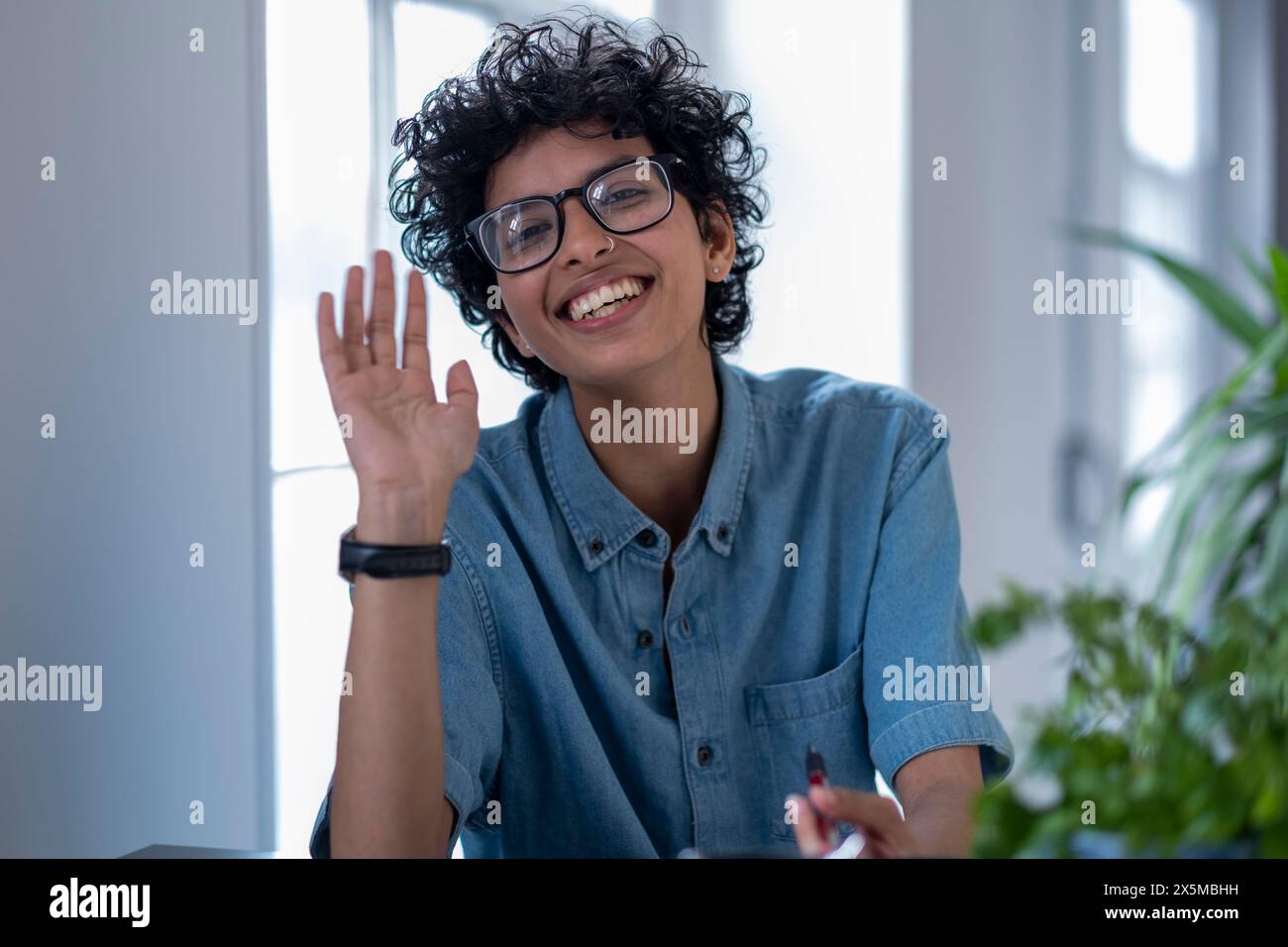Professional woman smiling waving hi-res stock photography and images ...