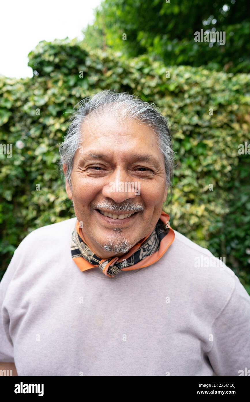 Portrait of smiling senior man outdoors Stock Photo - Alamy