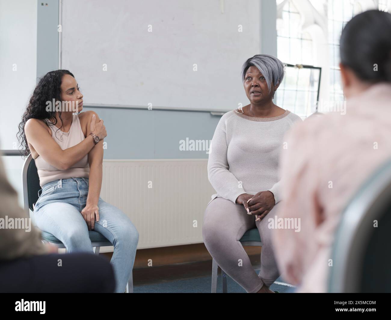 People in group therapy session Stock Photo - Alamy