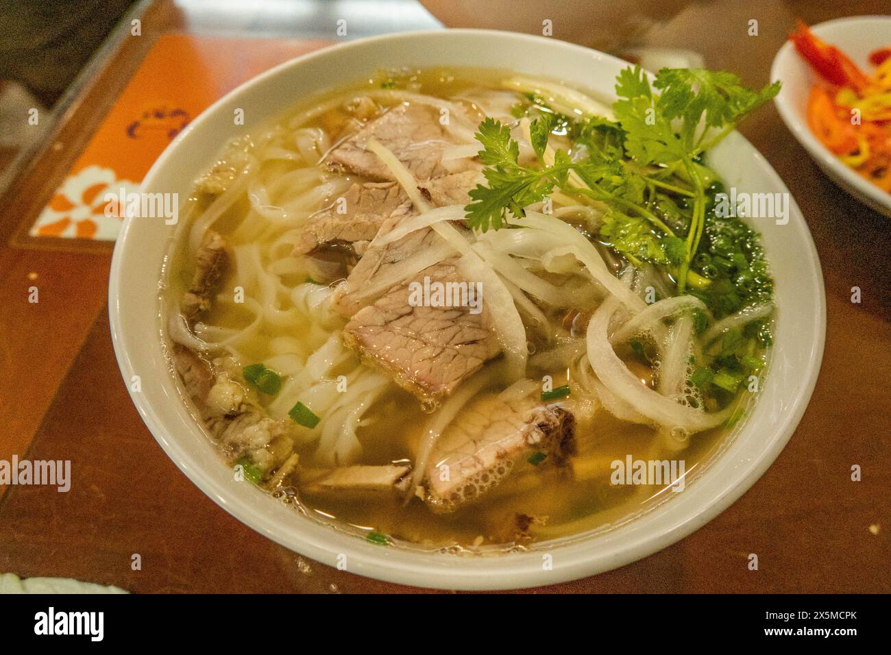 Fresh bowl of beef pho at the famed Pho 10 Ly Quoc Su restaurant, Hanoi ...