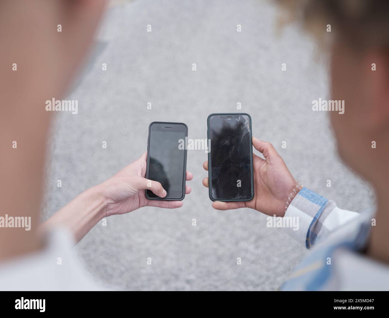 Men using smart phones Stock Photo - Alamy