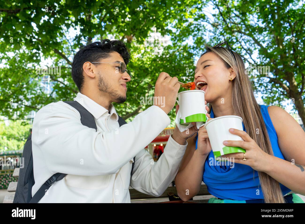 Men eating street food hi-res stock photography and images - Alamy