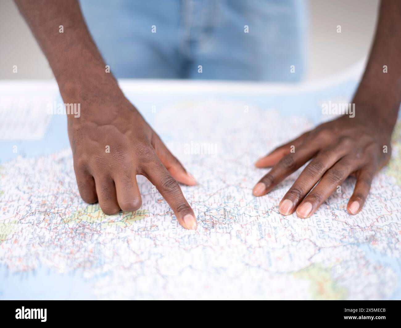 Man pointing at map hi-res stock photography and images - Alamy