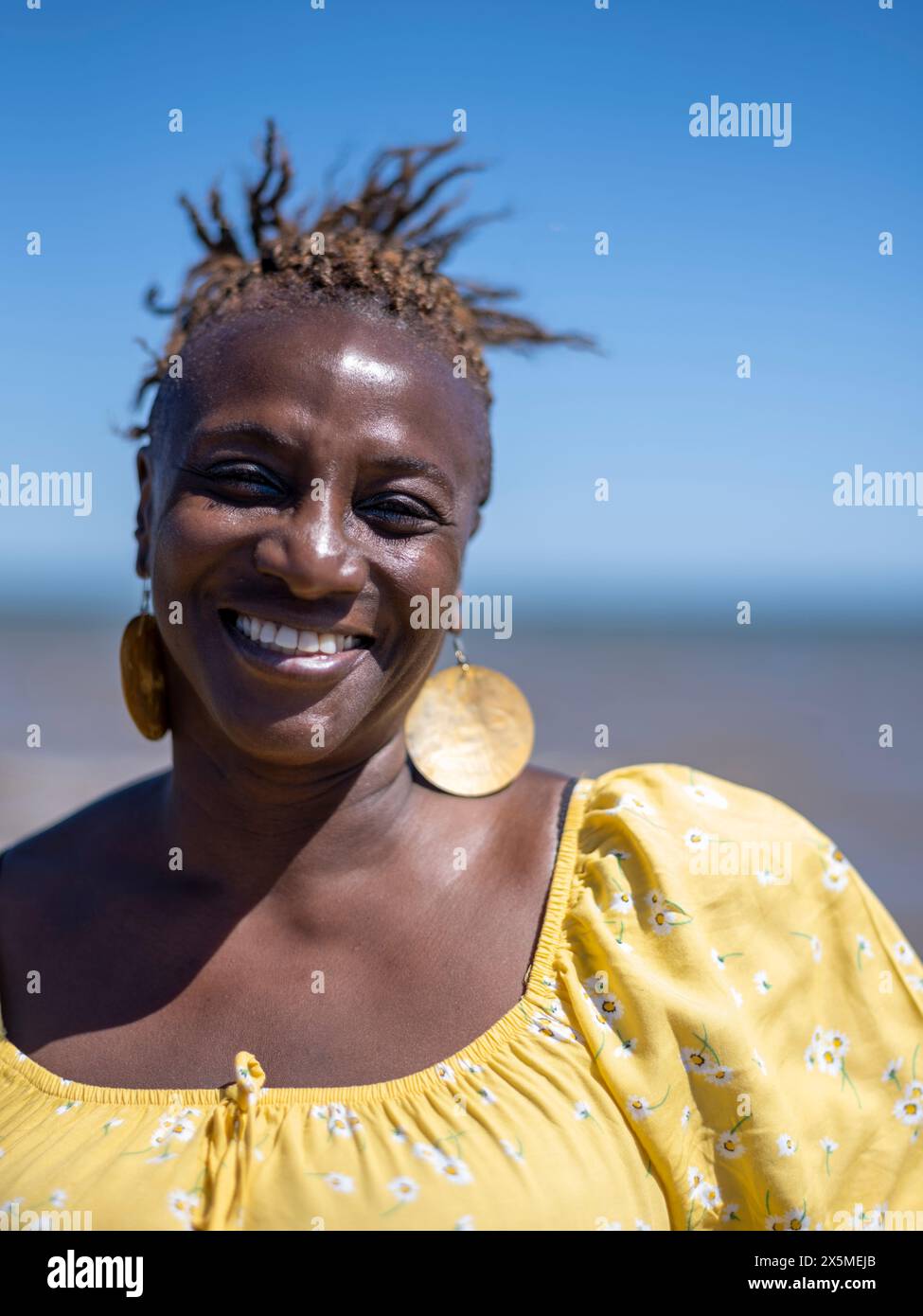 Adult mature woman on beach hi-res stock photography and images - Alamy