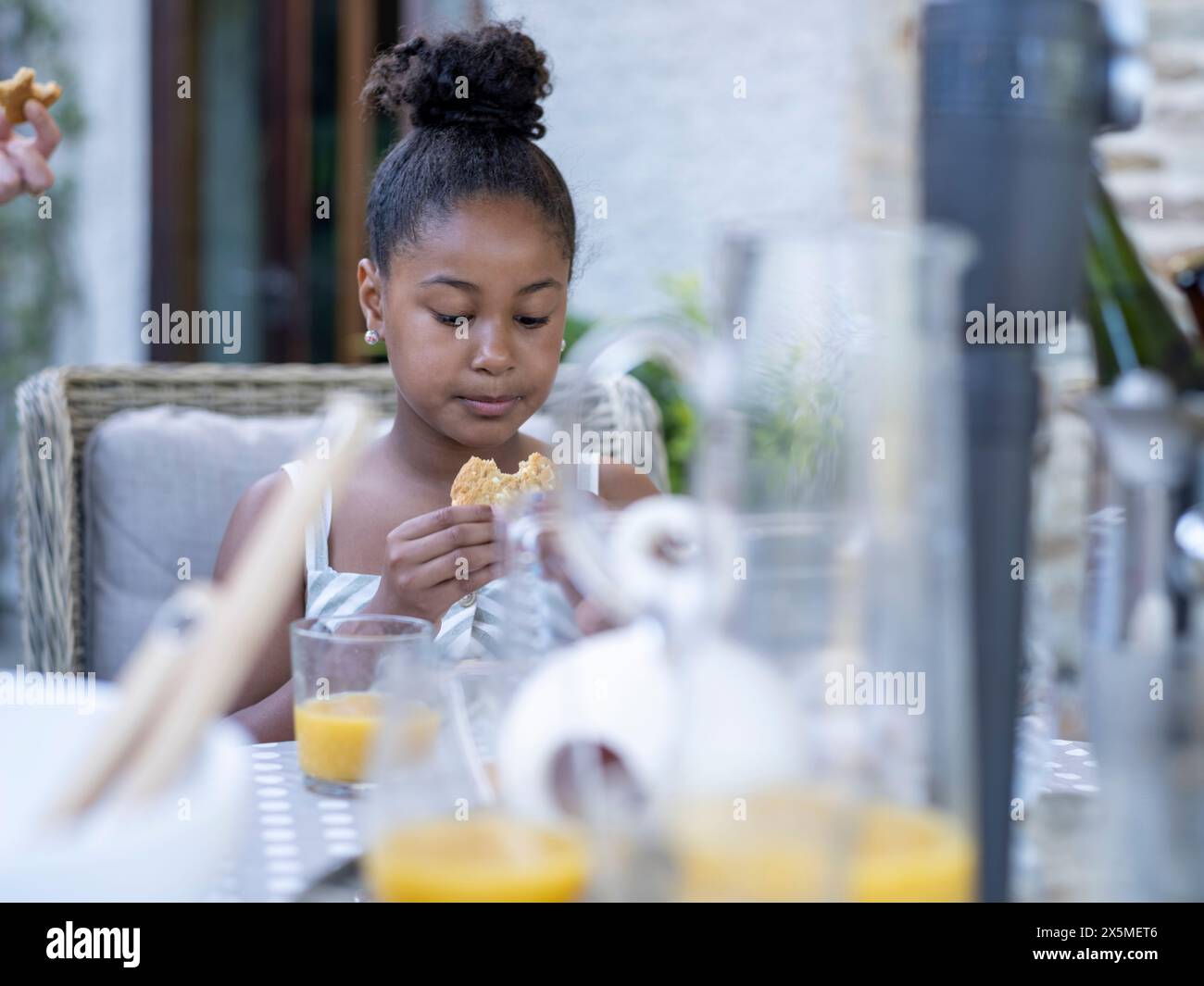 Girl at garden table hi-res stock photography and images - Alamy