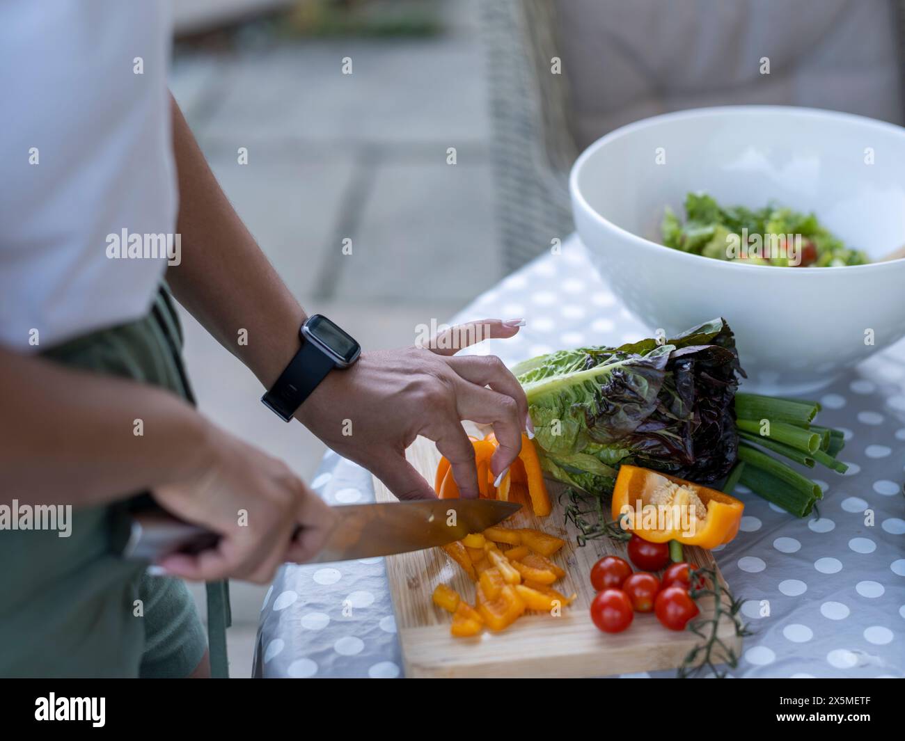 Close up woman cutting tomato hi-res stock photography and images - Alamy