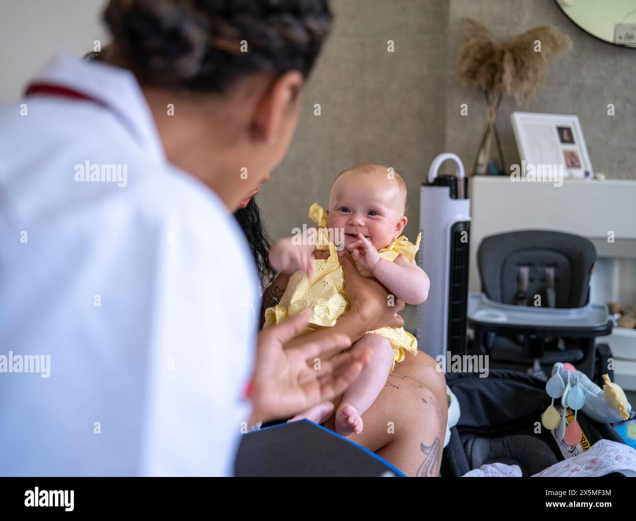 Visiting nurse mother home baby hi-res stock photography and images - Alamy