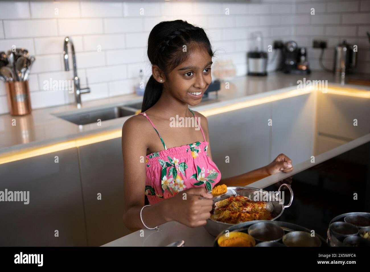 Indian girl cooking hi-res stock photography and images - Alamy