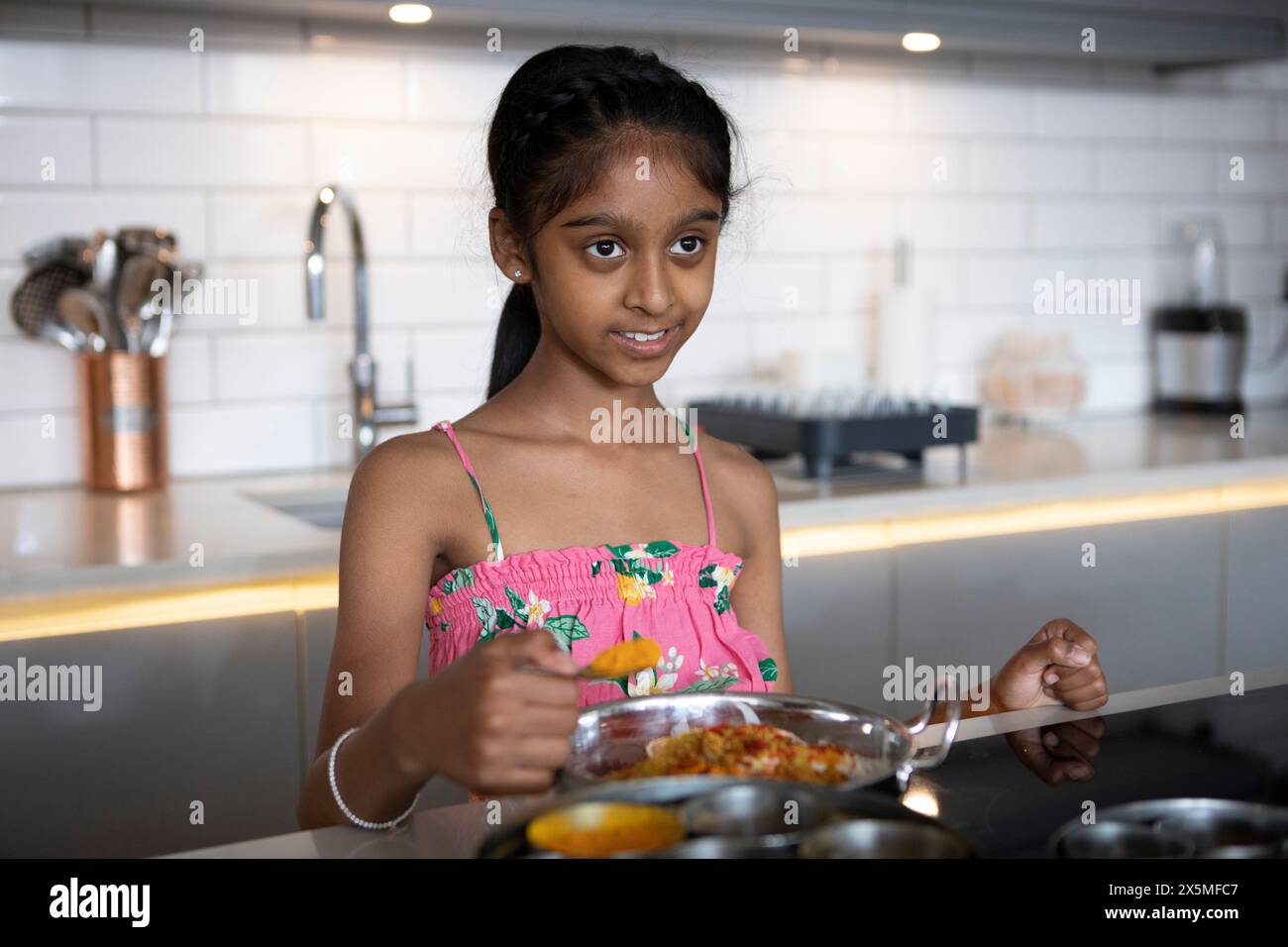 Indian girl cooking hi-res stock photography and images - Alamy