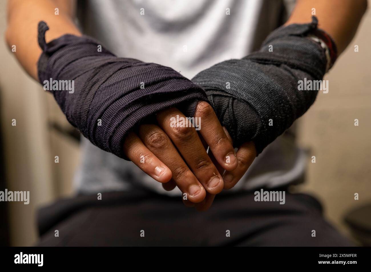 Young woman with hands wrapped before boxing match, close up Stock ...