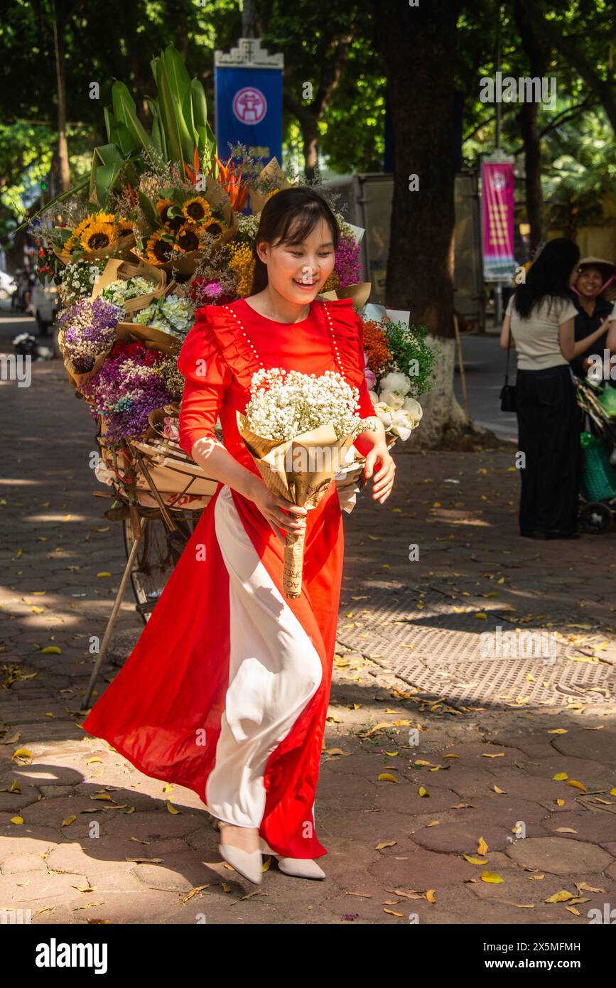 Women in ao dai on Phan Dinh Phung Street, Hanoi, Vietnam Stock Photo ...