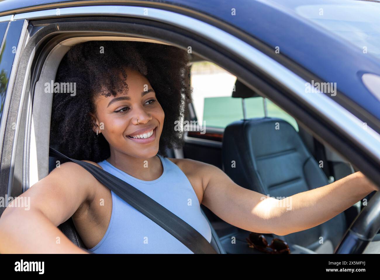 Woman driving car uk hi-res stock photography and images - Alamy