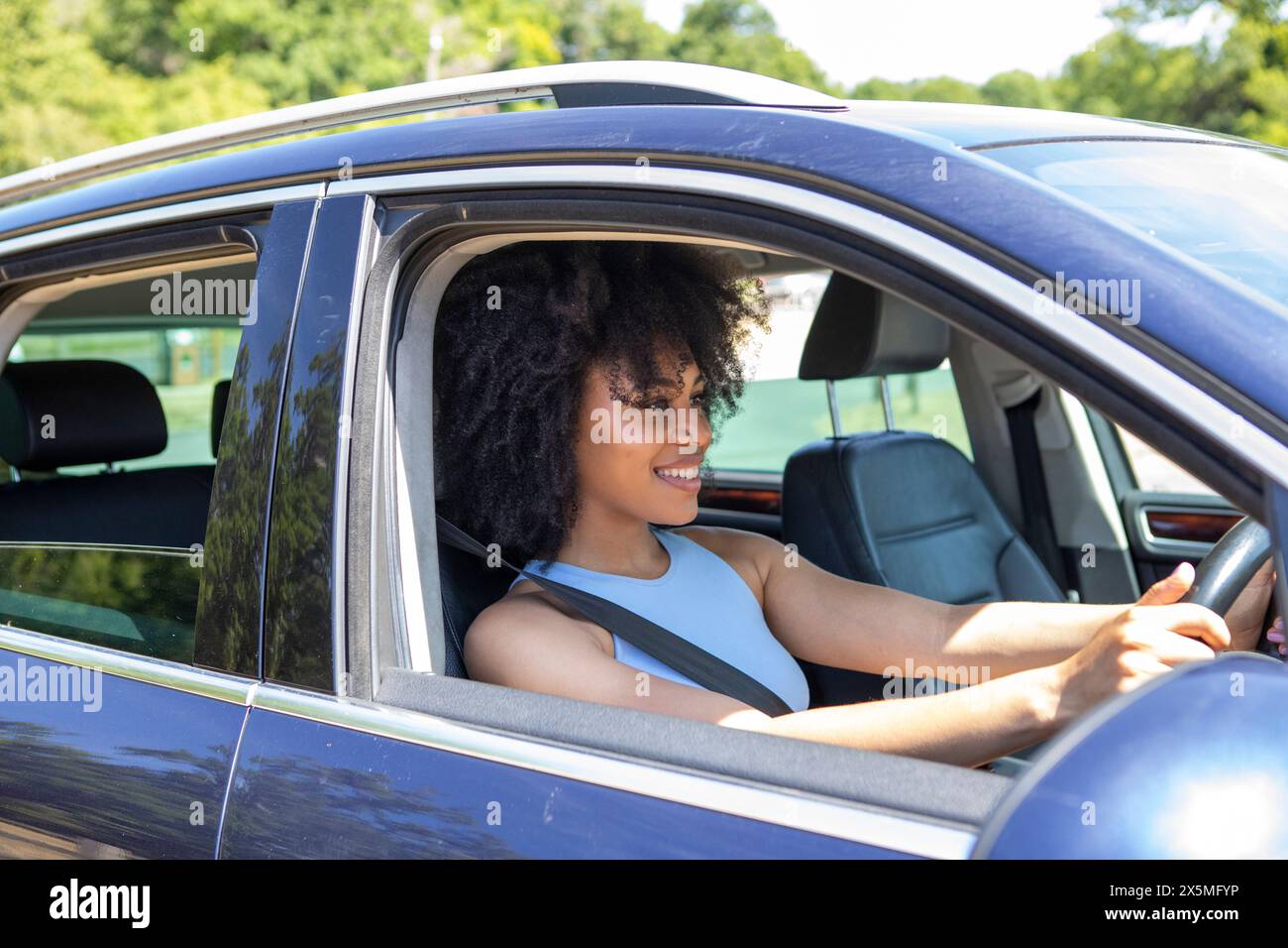 Woman driving car uk hi-res stock photography and images - Alamy