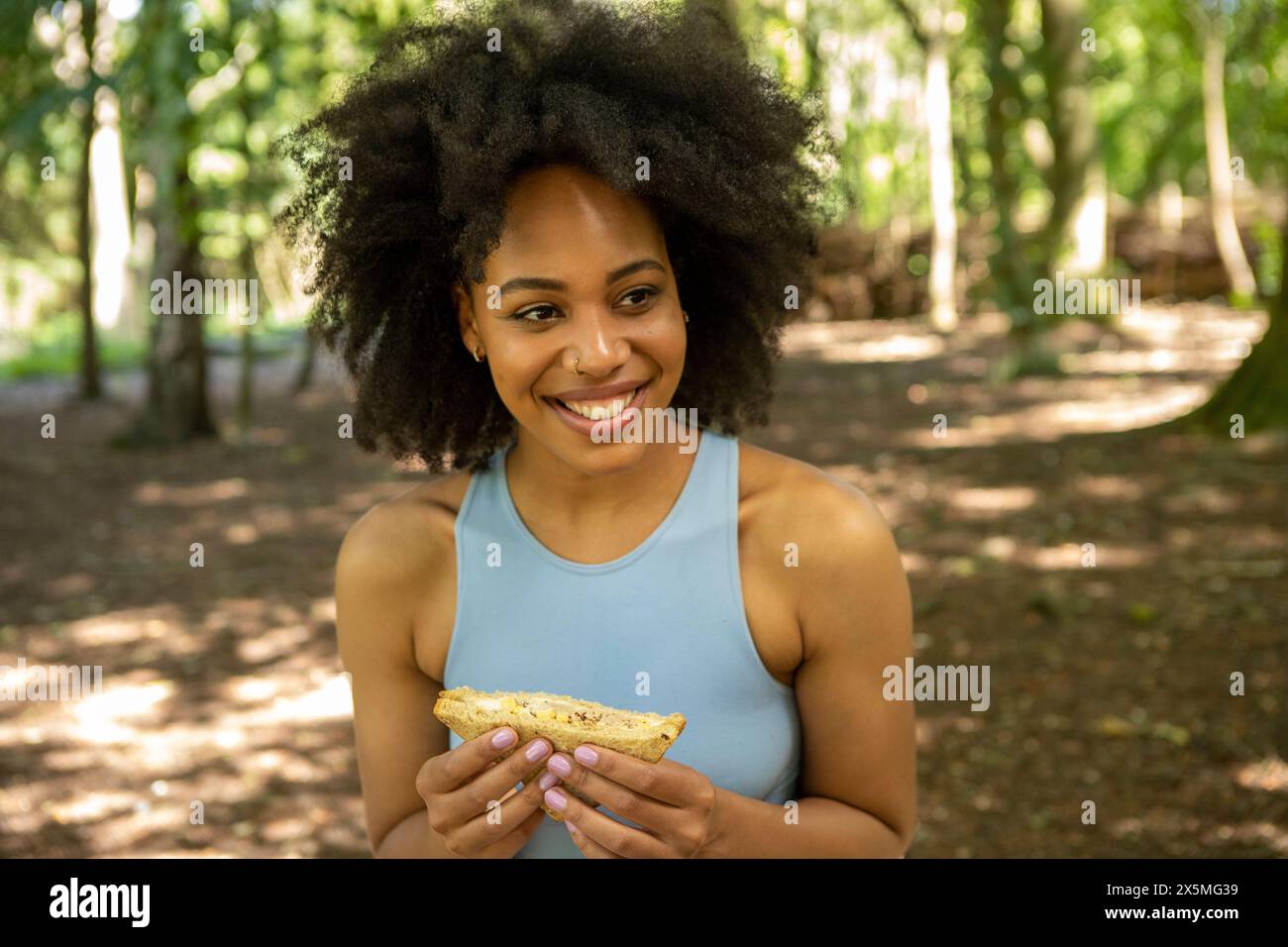Woman eating picnic hi-res stock photography and images - Alamy