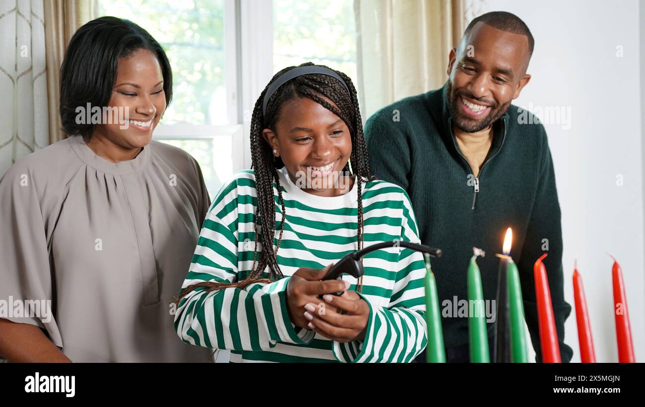 Child lighting kinara hi-res stock photography and images - Alamy