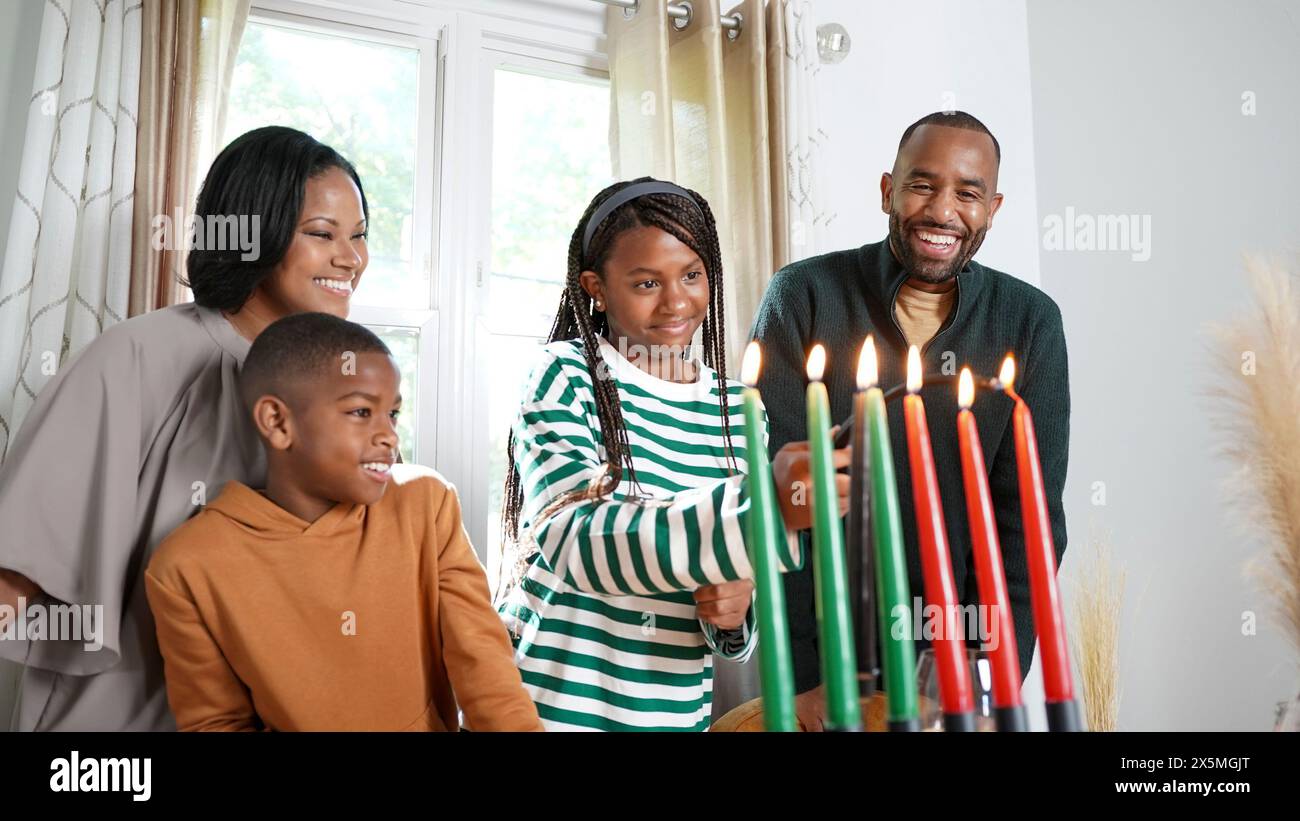 Child lighting kinara hi-res stock photography and images - Alamy