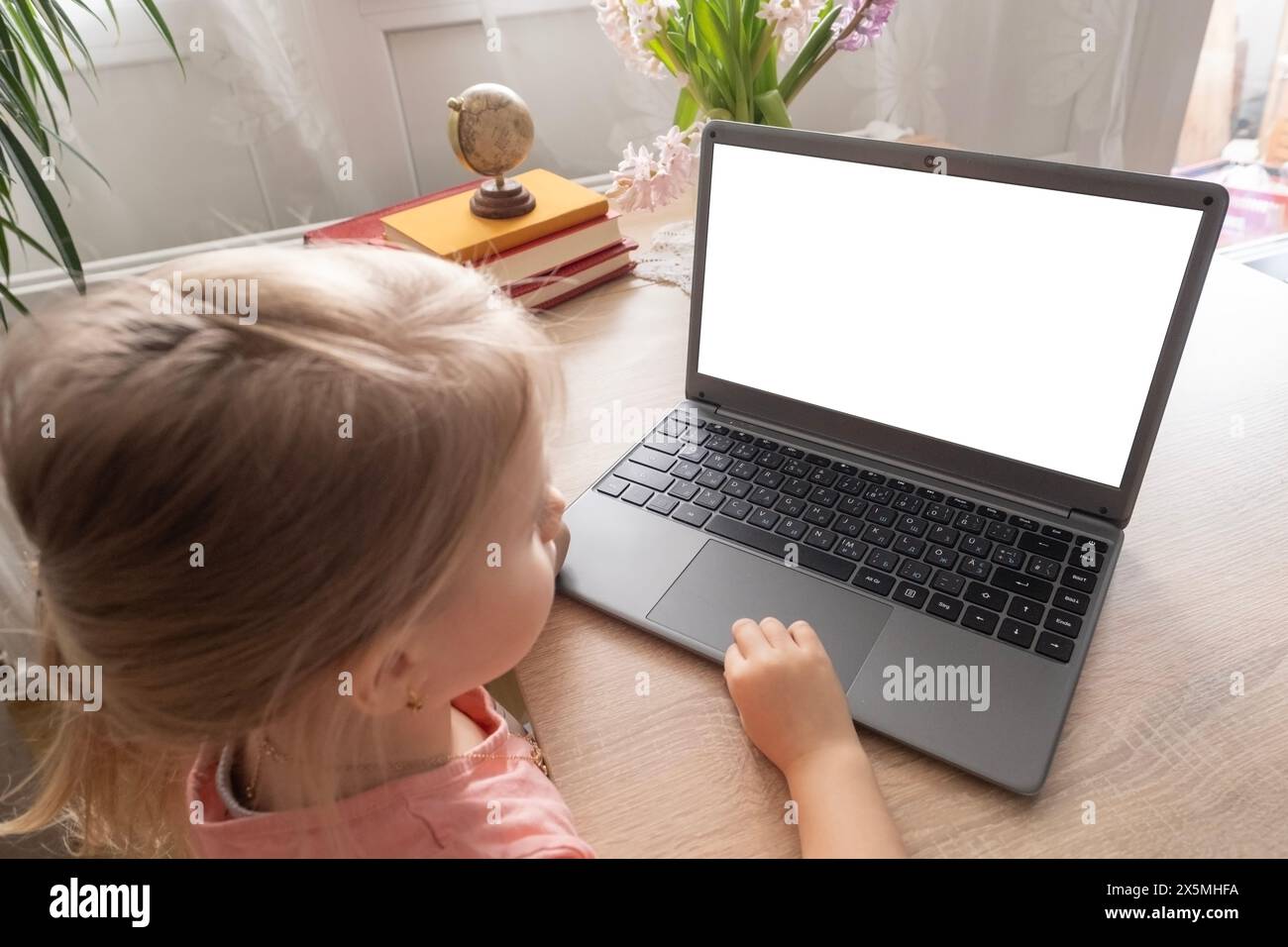 preschool girl studying distance learning course, using computer ...