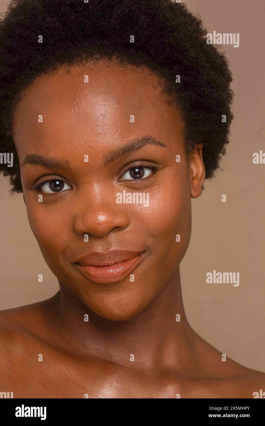 Studio portrait of smiling woman Stock Photo - Alamy