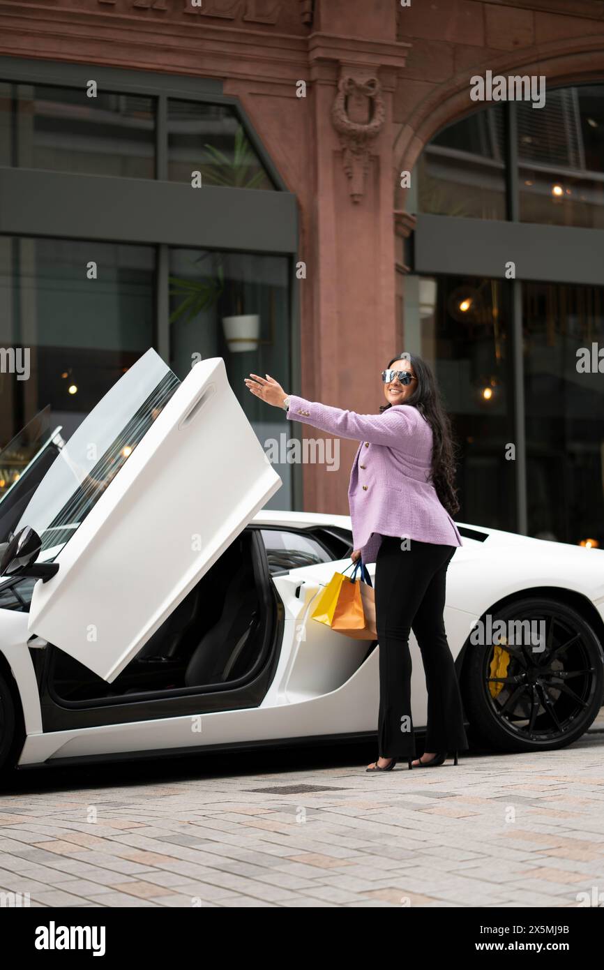 Person getting into car hi-res stock photography and images - Alamy