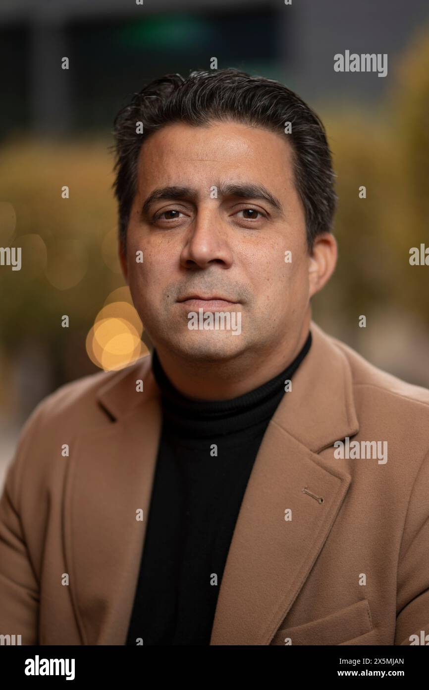 Man dressed in beige hi-res stock photography and images - Alamy