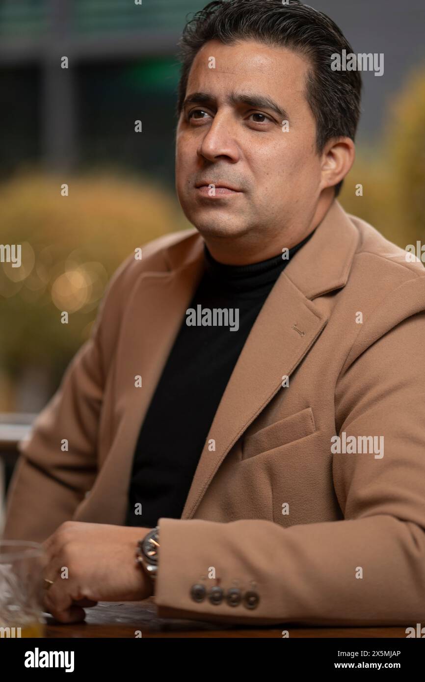 Man dressed in beige hi-res stock photography and images - Alamy