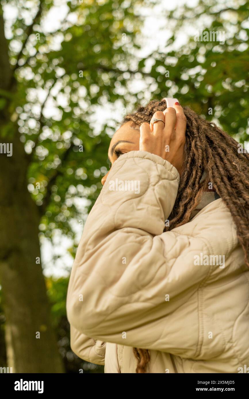 Autumn woman in park hi-res stock photography and images - Alamy
